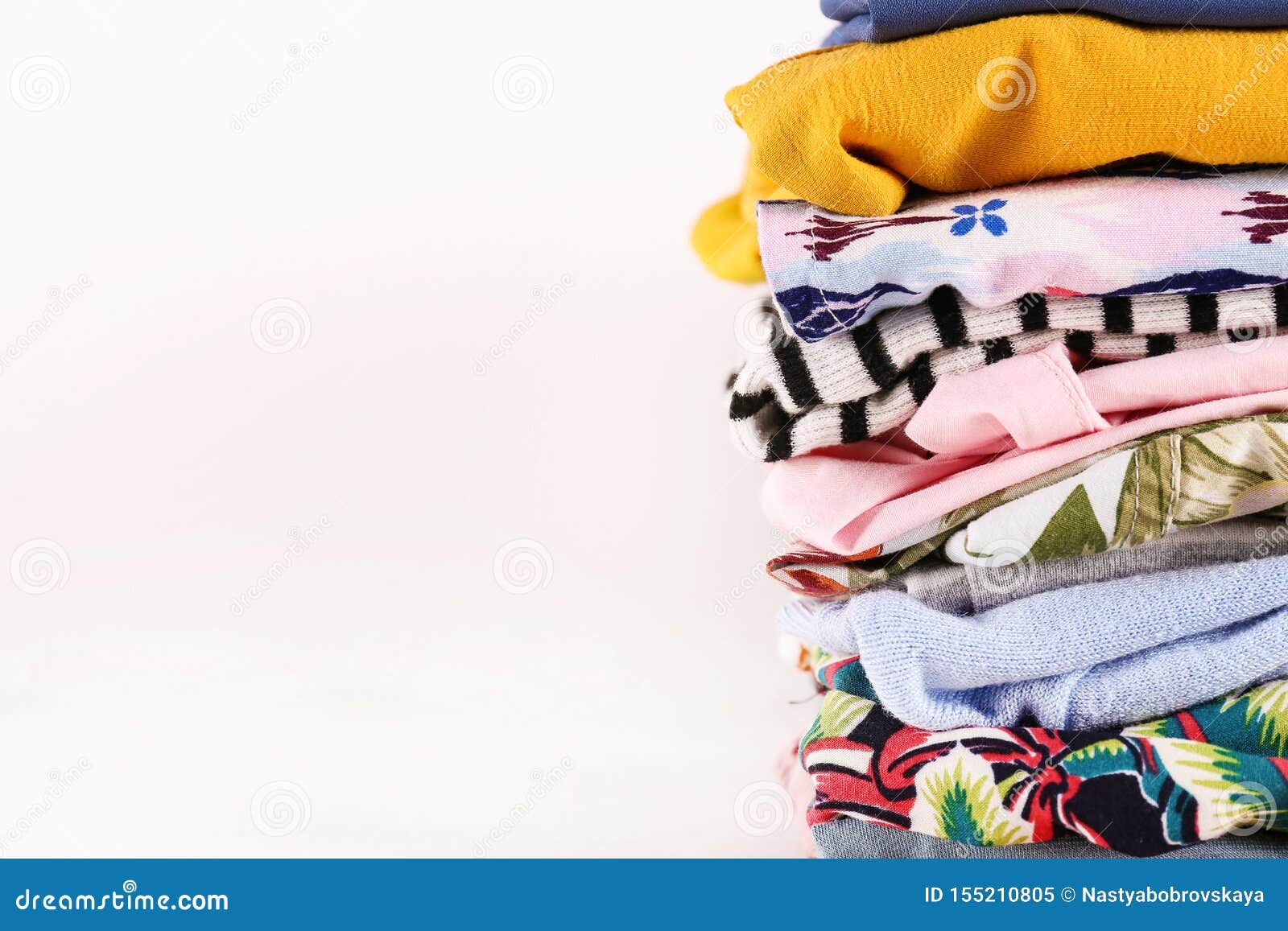 Bunch of Different Colorful Clothing Items Folded in Stack Stock Image ...