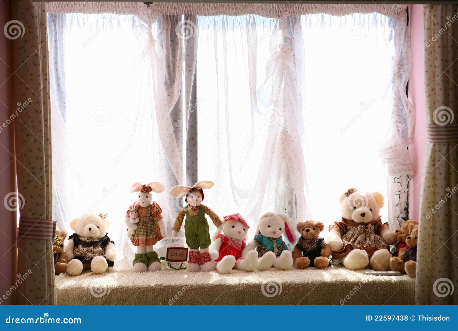 A Bunch of Dolls in the Window Stock Photo - Image of bears, bunnies ...