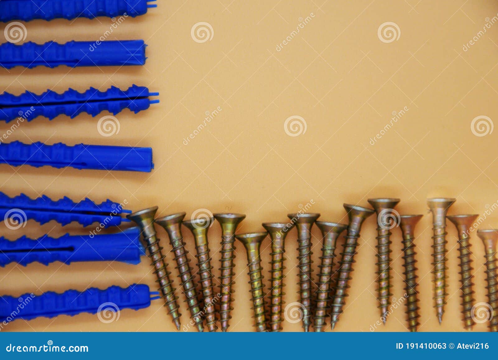 A Bunch of Dowel Nails and Plastic Plugs for Them. Stock Image - Image ...