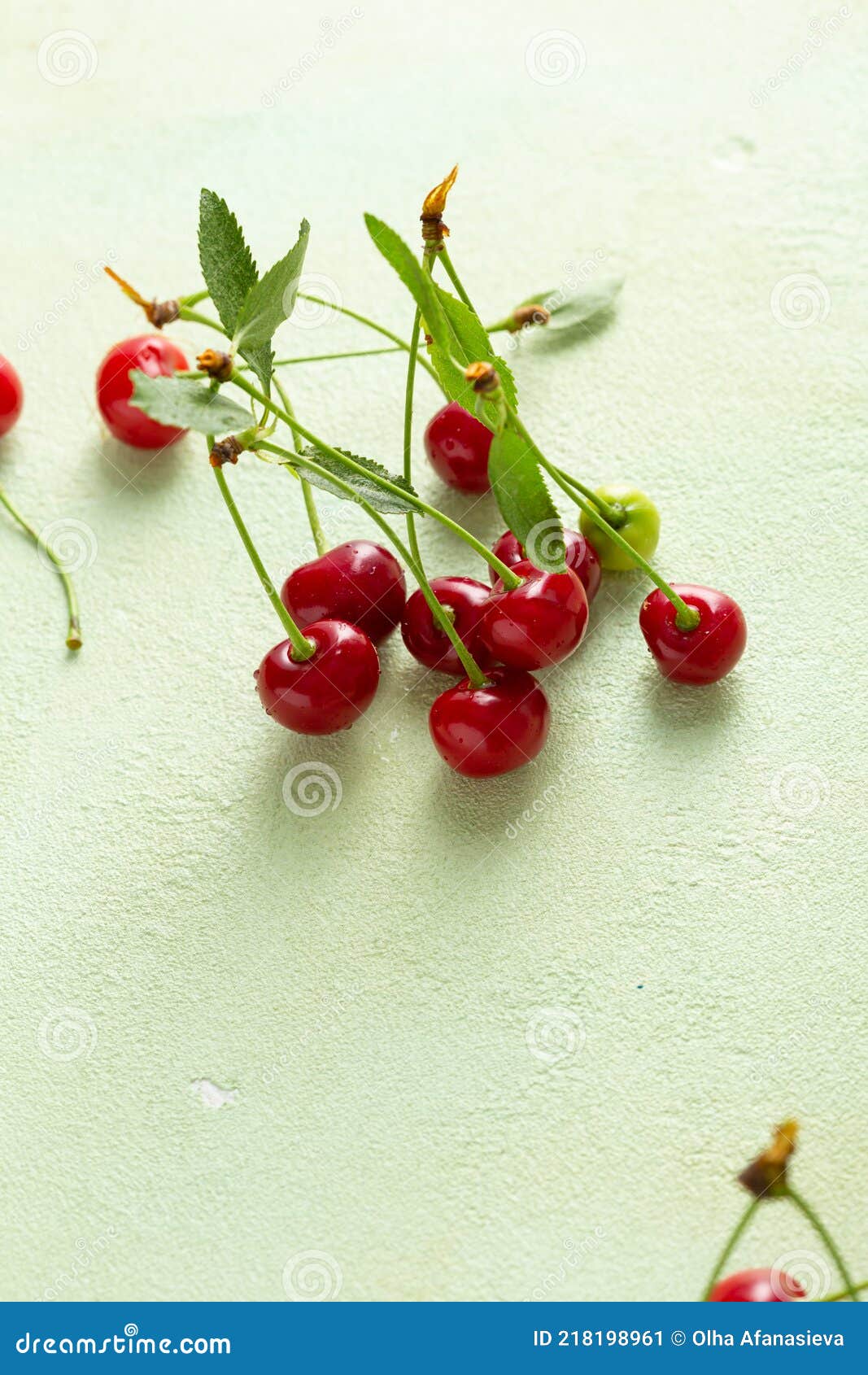 Bunch of Fresh Cherries on Light Green Surface Stock Image - Image of ...