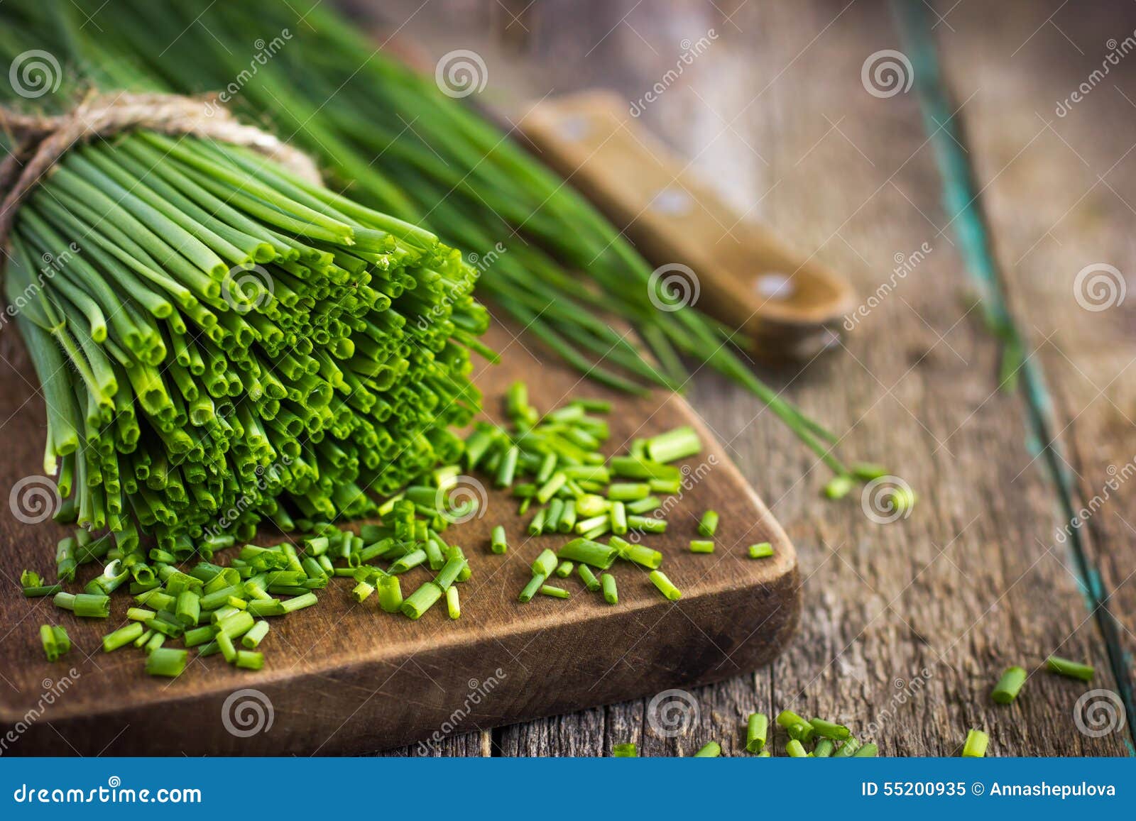 Bunch of Fresh Chives on a Wooden Cutting Board Stock Image - Image of ...