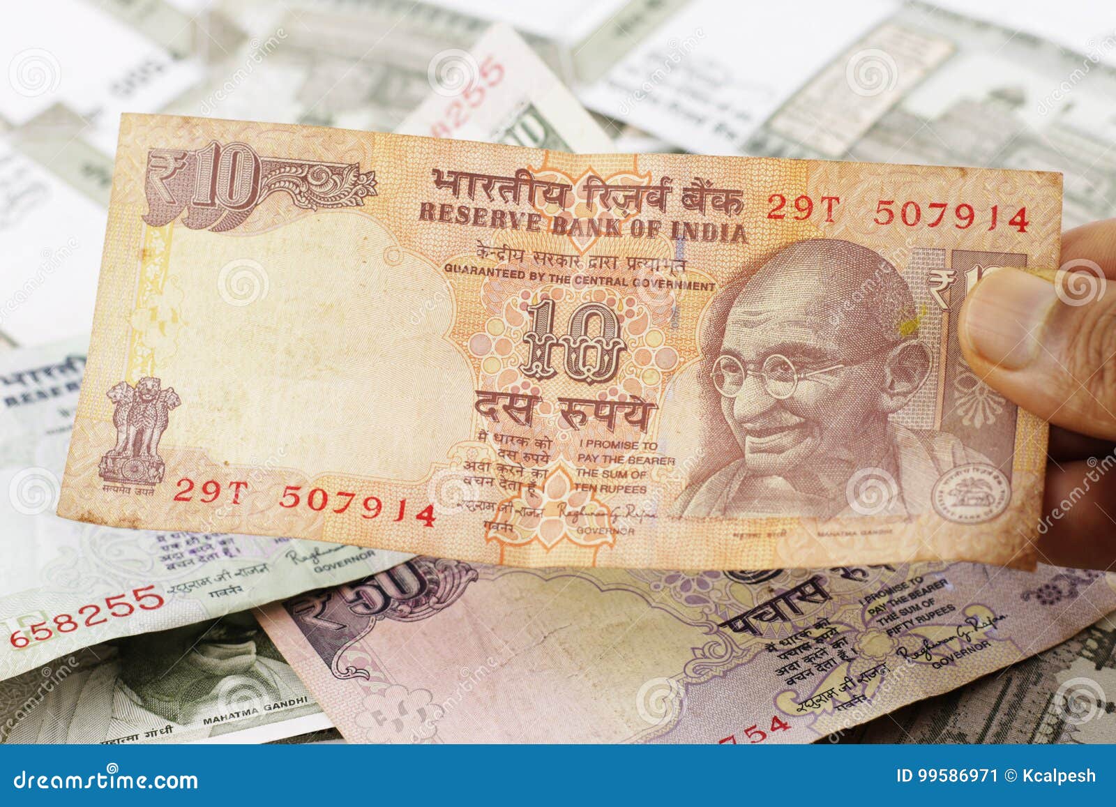 A Bunch of Indian Rupees stock image. Image of note, held - 99586971