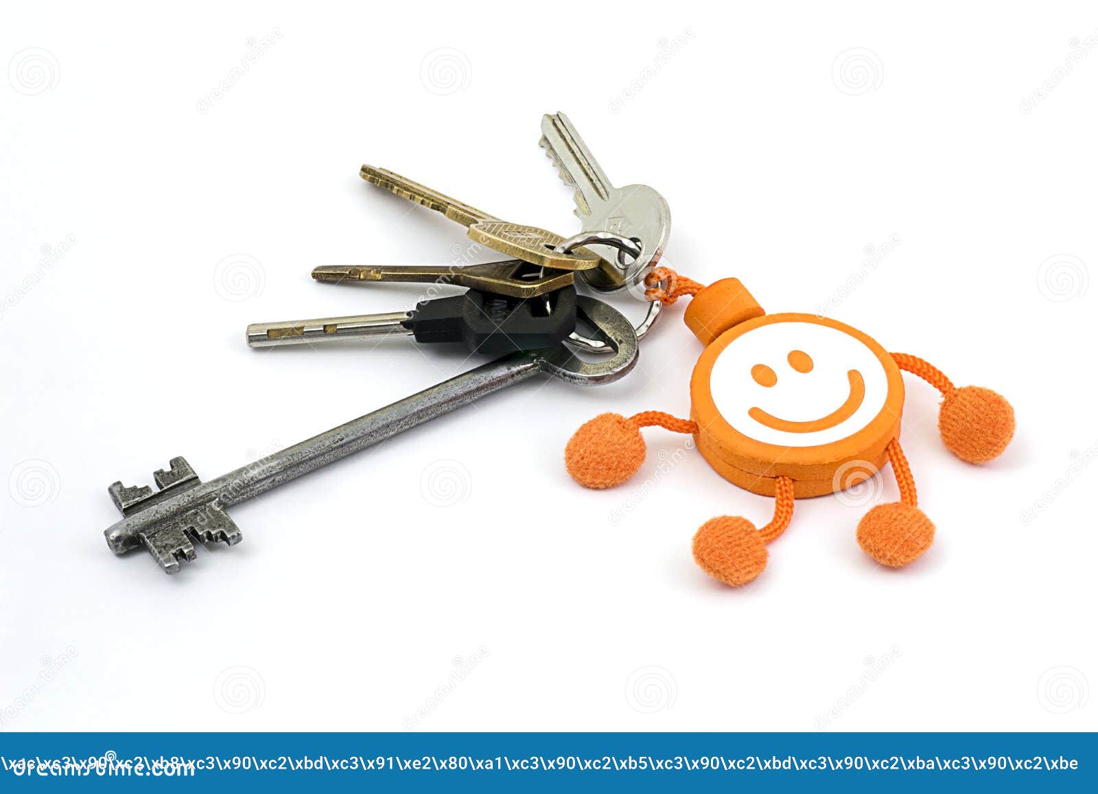 A Bunch of Keys with a Keyring a Smiley Face on White Background Stock ...