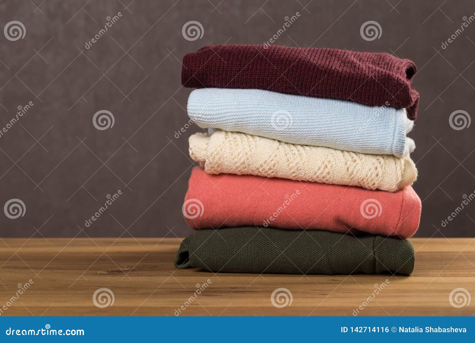 Bunch of Knitted Warm Sweaters with Different Knitting Patterns Folded ...