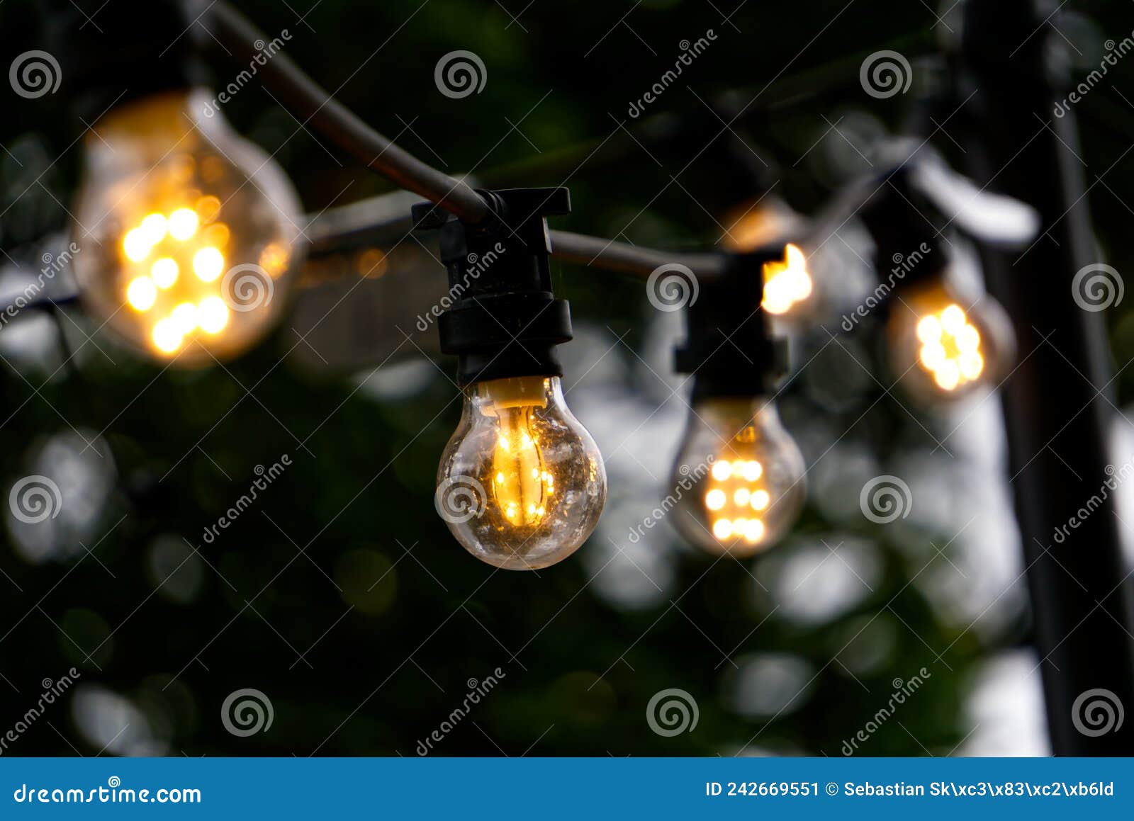 A Bunch of Light Bulbs Hanging Stock Image - Image of streetlight ...