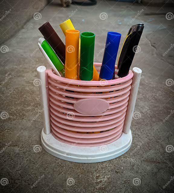 A Bunch of Markers on a Container Stock Photo - Image of container ...
