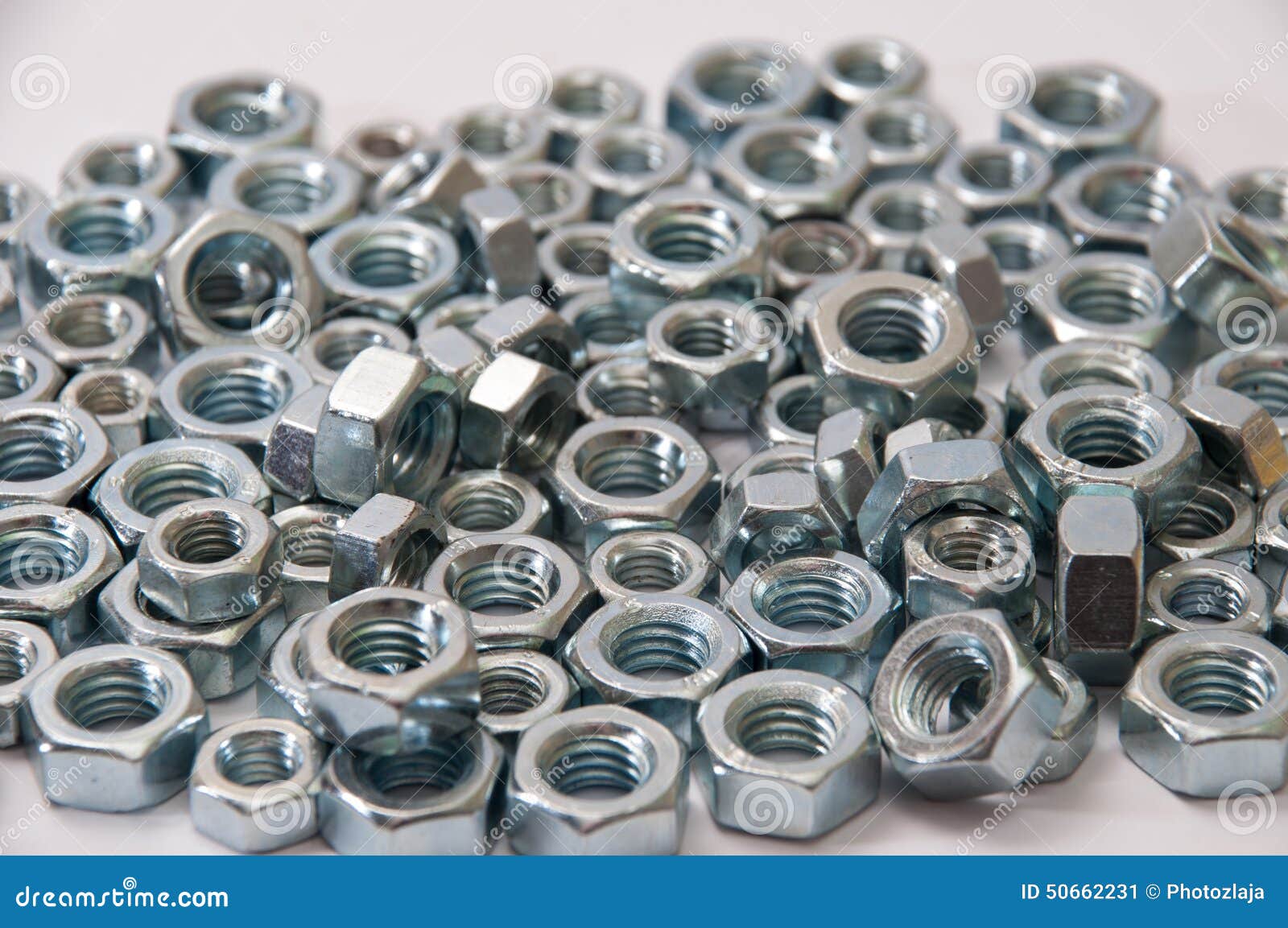 Bunch of Metal Nuts on a White Background Stock Image - Image of ...