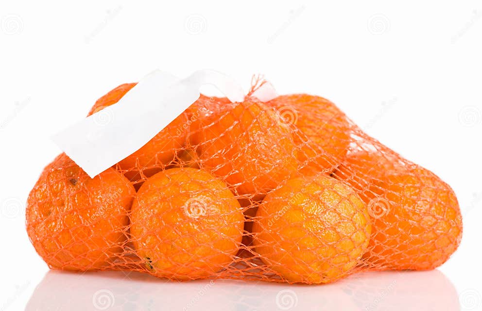 A Bunch of Oranges Packaged in Red Netting, Isolated on White Stock ...