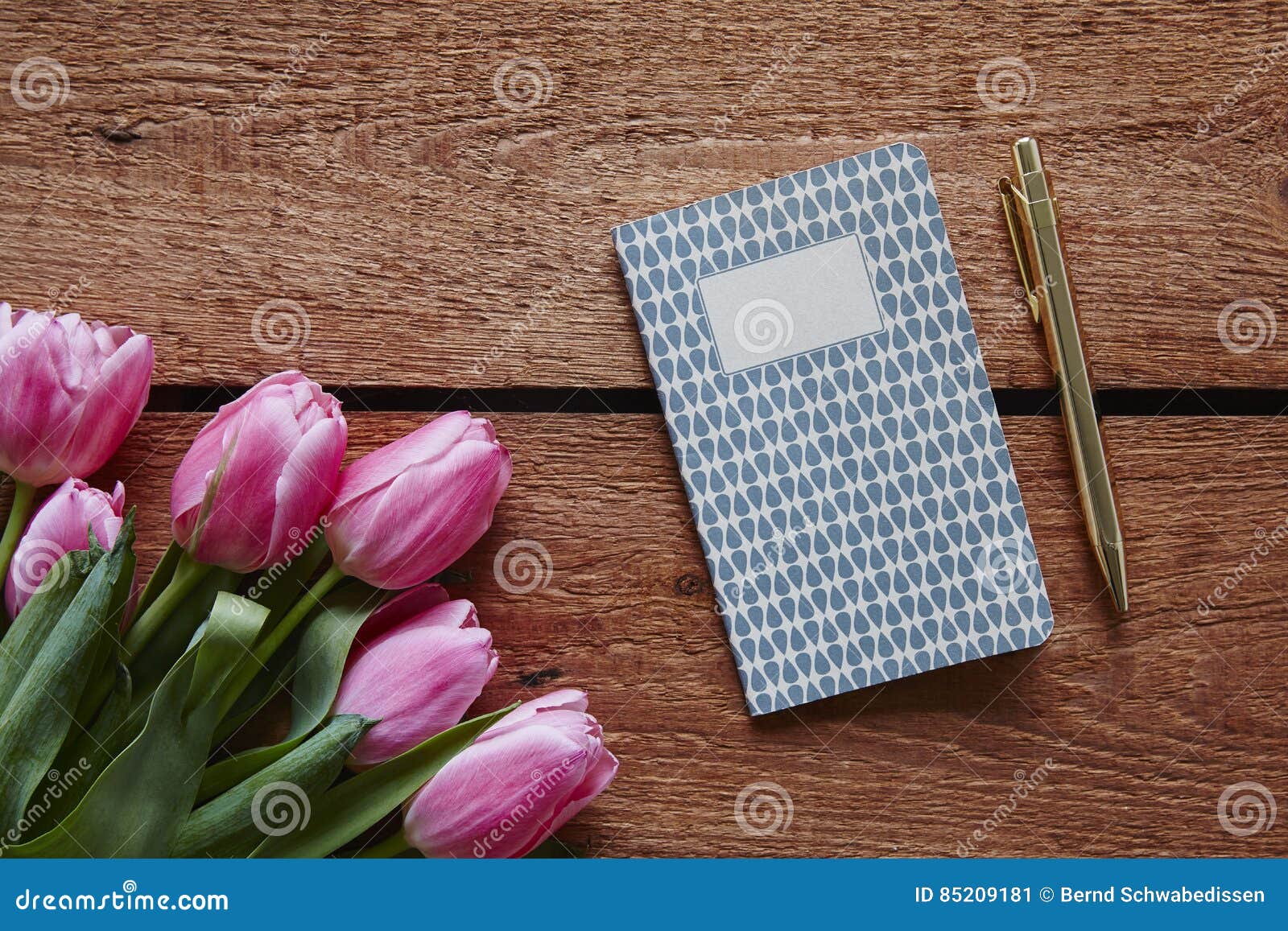 A Bunch of Pink Tulips Writing in a Notebook Spring Atmosphere Stock ...