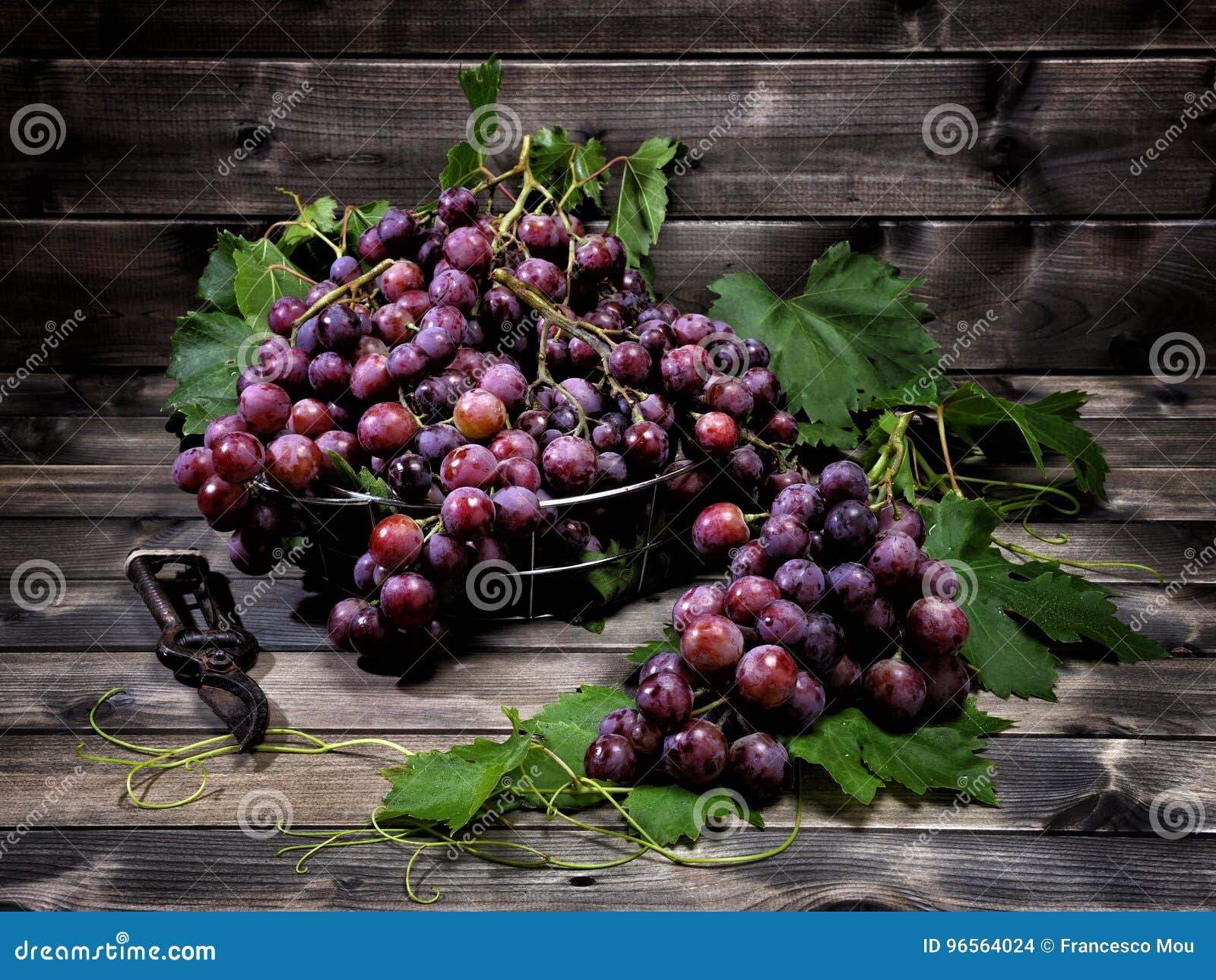 Bunch of Red Grapes on an Old Wooden Table. Stock Photo - Image of ...