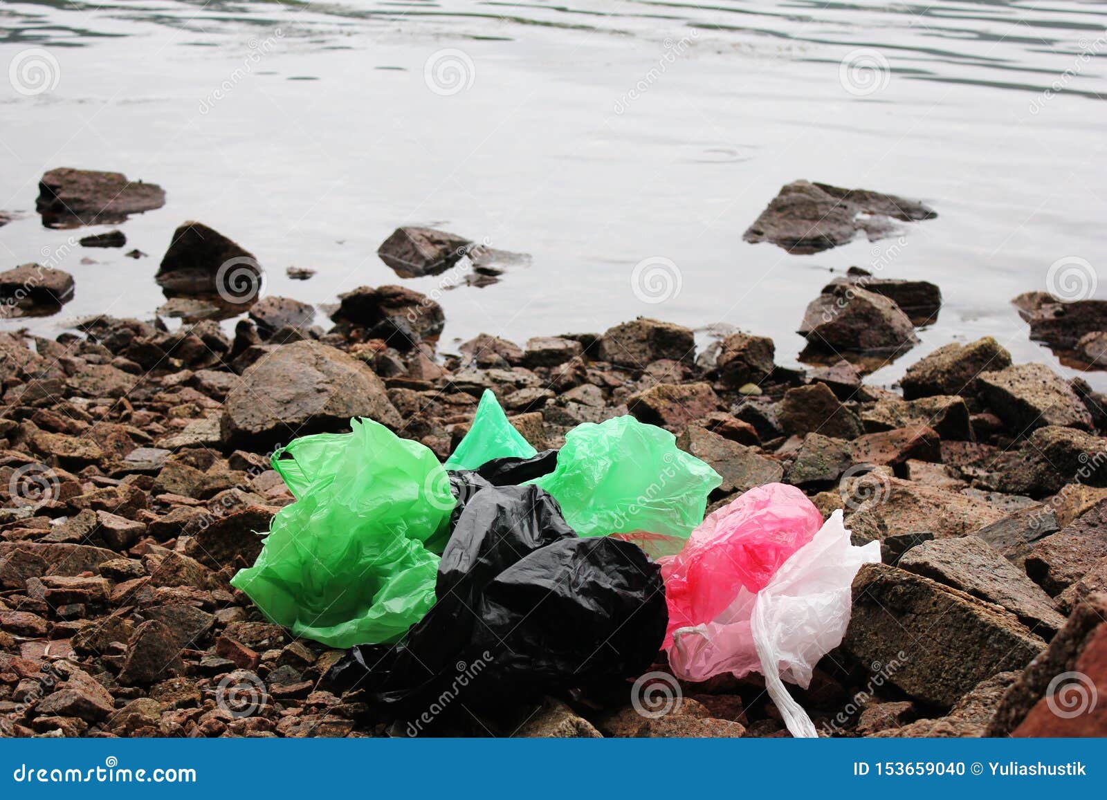 A Bunch of Reusable, Multi-colored Plastic Bags Polluting the ...