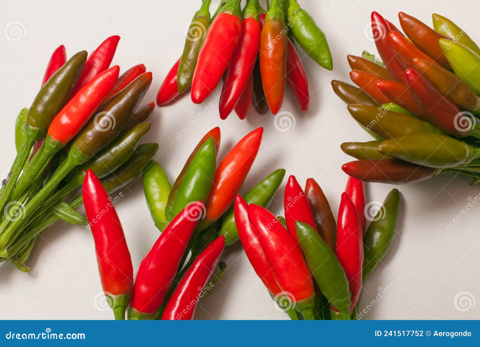 Bunch of Small Chili Peppers Stock Photo - Image of heat, ripe: 241517752