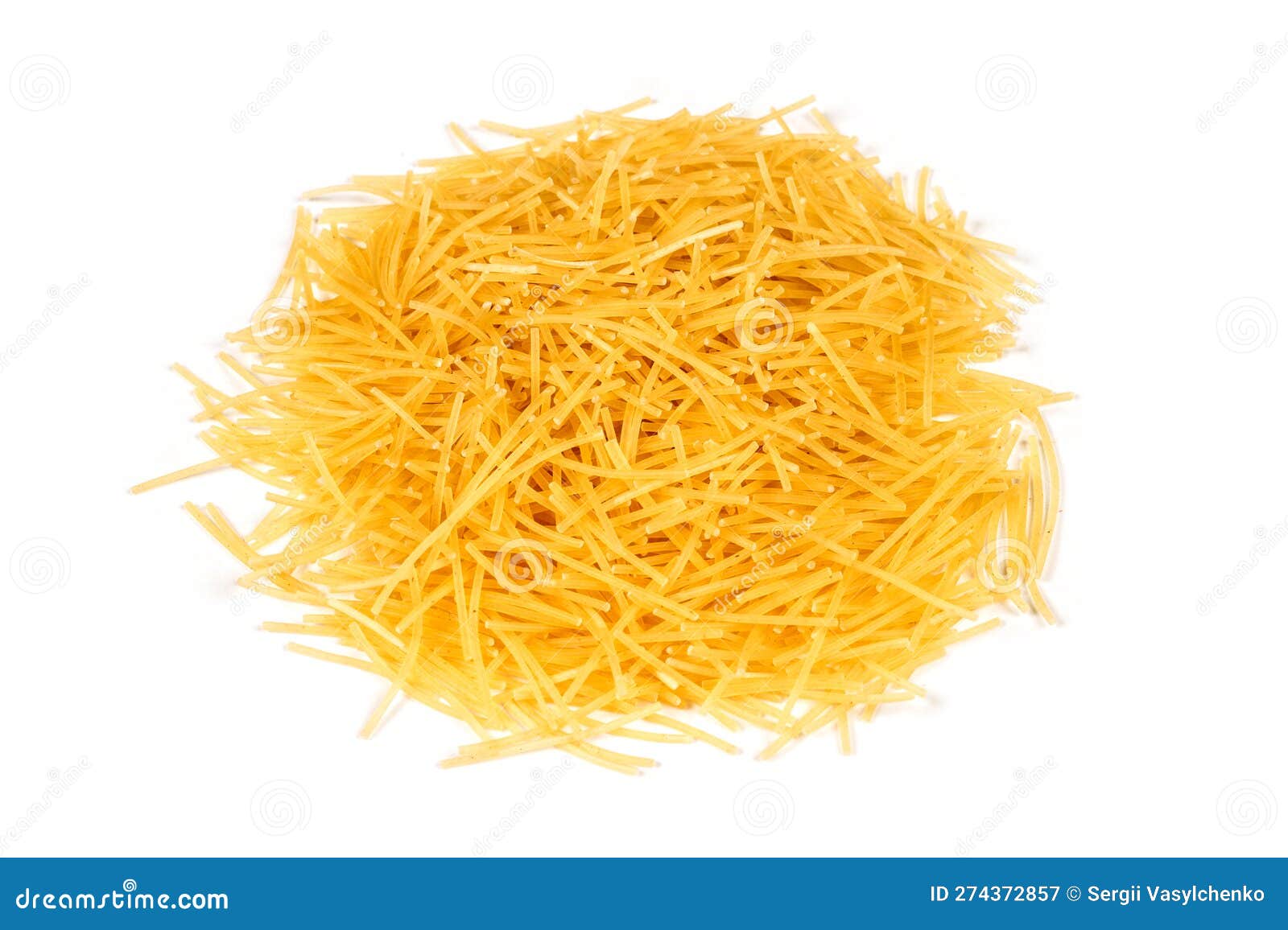 Raw Small Pasta In The Shape Of A Spring. Pasta In A White Plate On A ...