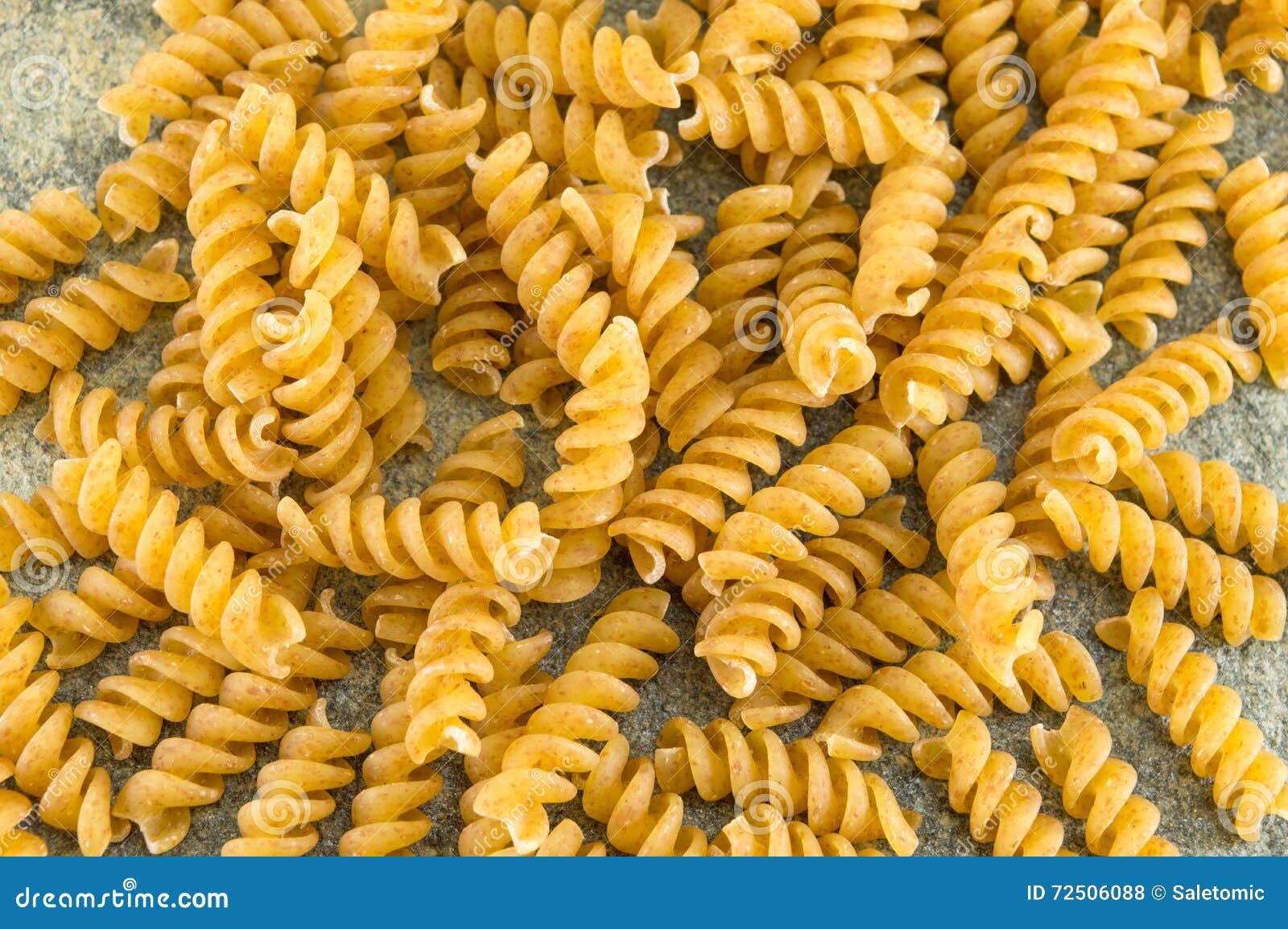 Bunch of Sprial Golden Colored Macaroni Pasta Stock Photo - Image of ...