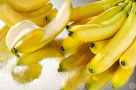 A bunch of wet bananas stock image. Image of hawaii, rind - 19214415