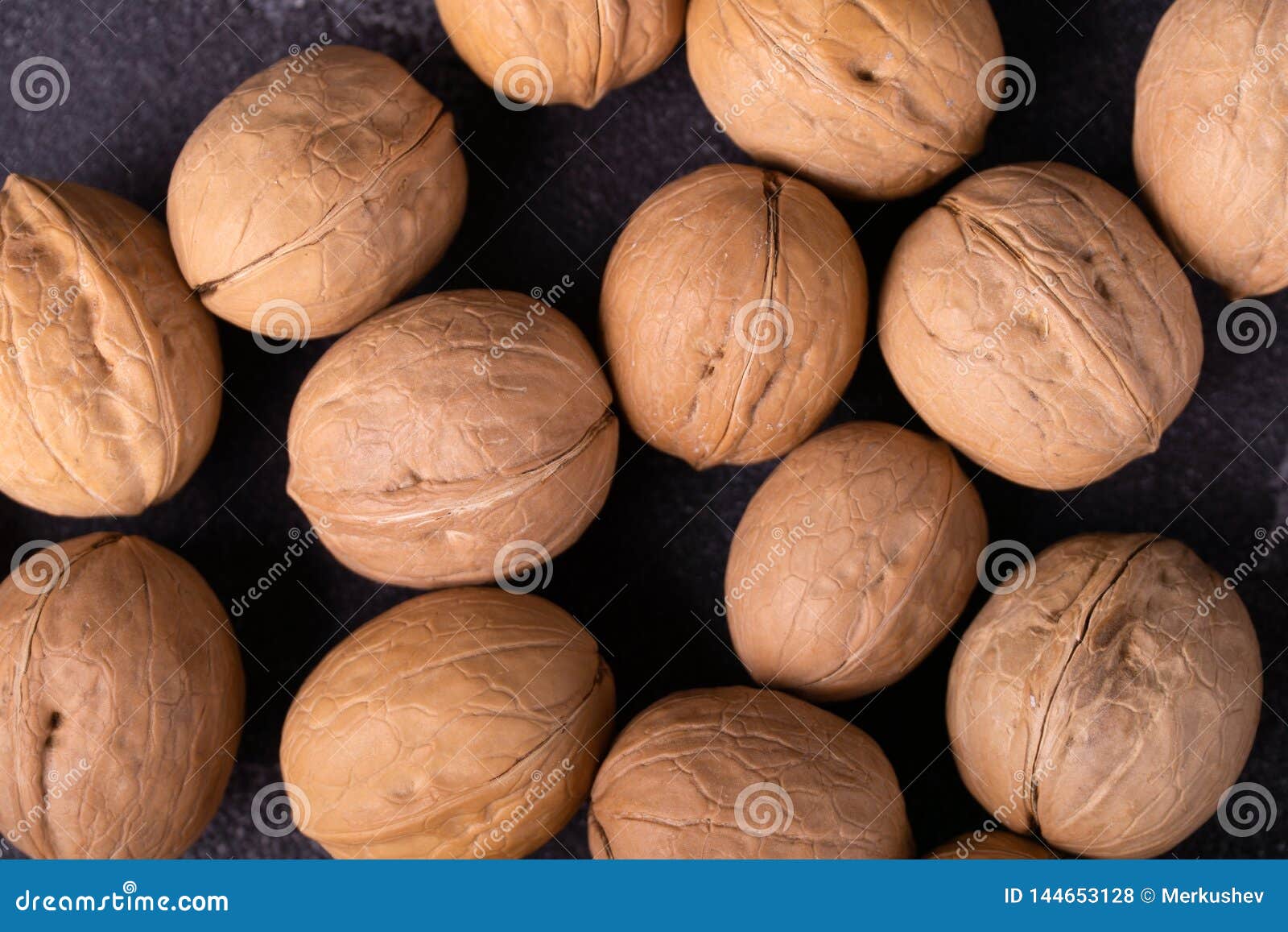 Bunch of Whole Walnuts on Dark Blue Slate Background. Healthy Diet ...