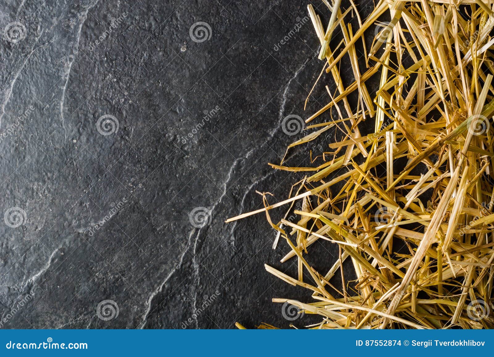 A Bunch of Yellow Straw on the Black Background of an Empty Slab of ...