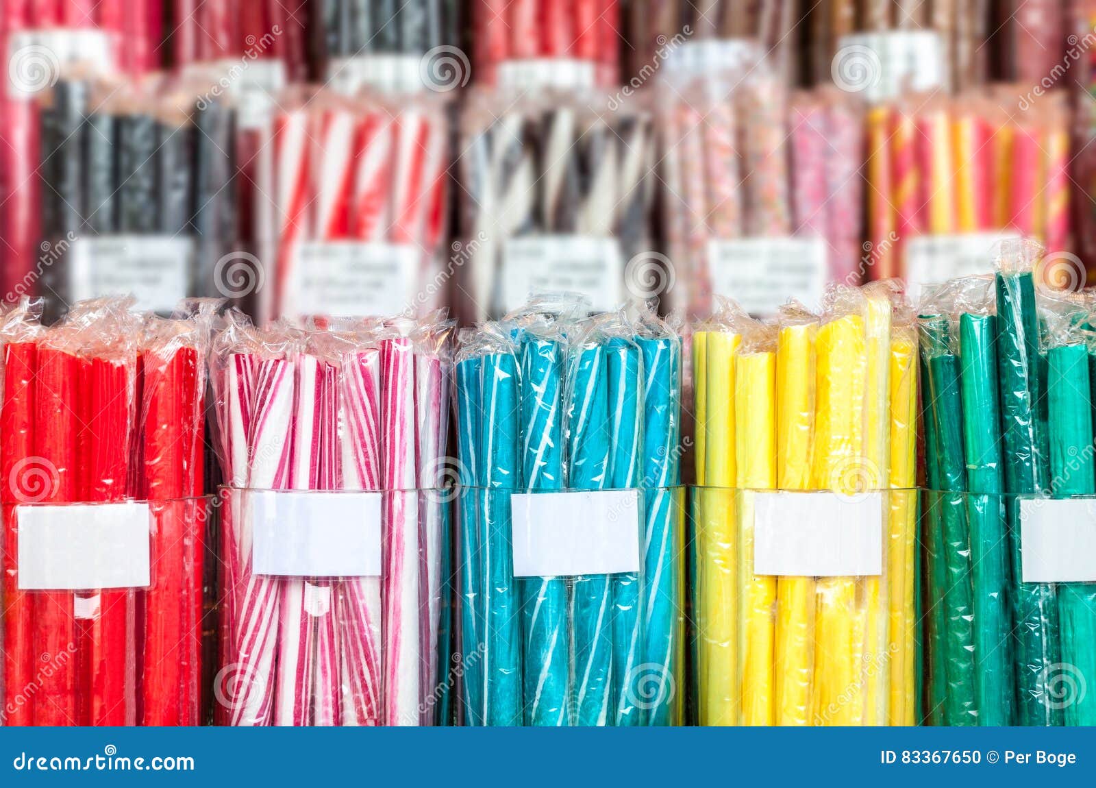Bunches of Candy Sticks in Different Colors Wrapped in Plastic ...