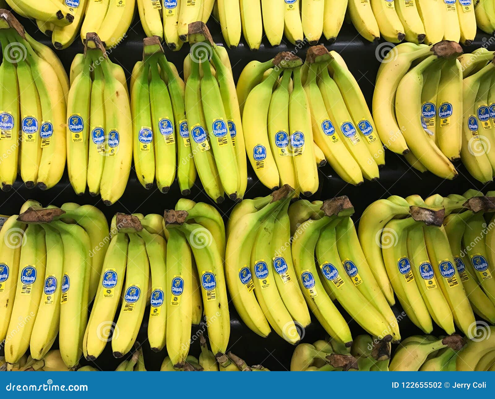 Bunches of Chiquita Bananas for Sale in a Produce Department of a ... Bunches of Chiquita Bananas for Sale in a Produce Department of a ...
