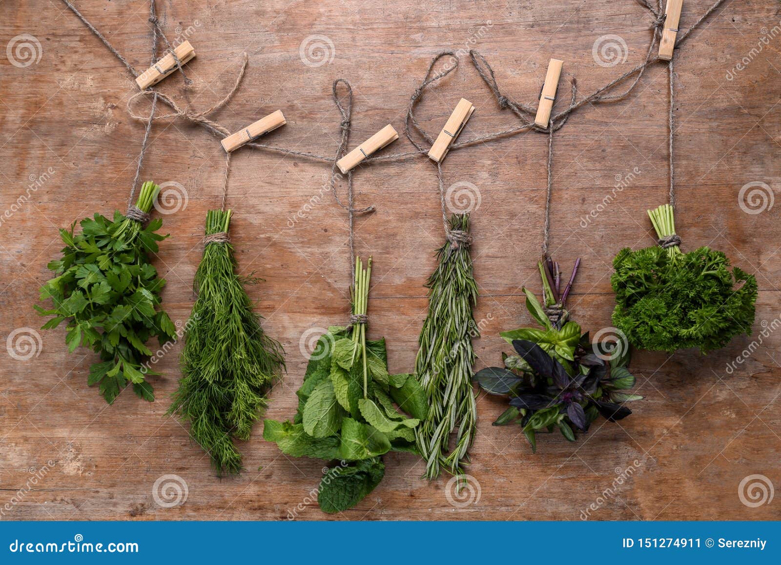 Bunches of Different Fresh Herbs on Wooden Background Stock Image ...