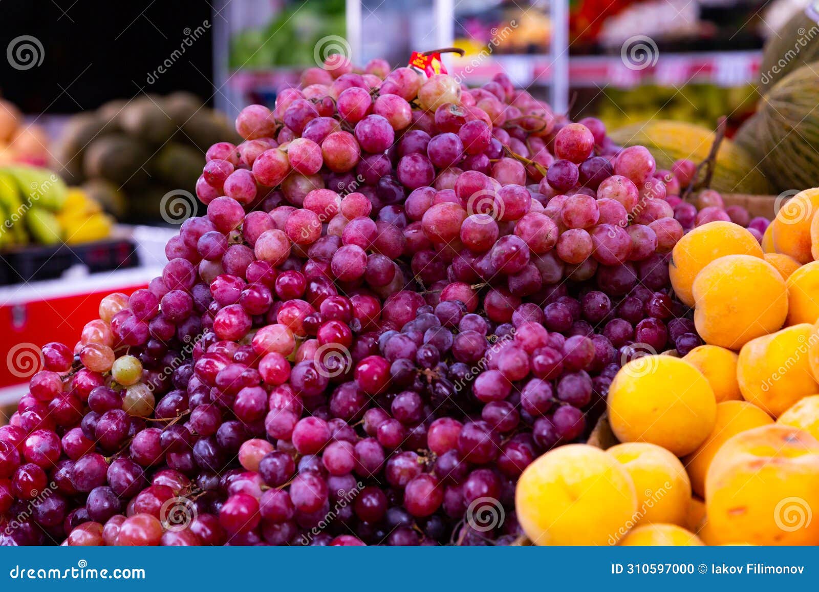 Bunches of Red Grapes in Grocery Store Window Stock Photo - Image of ...
