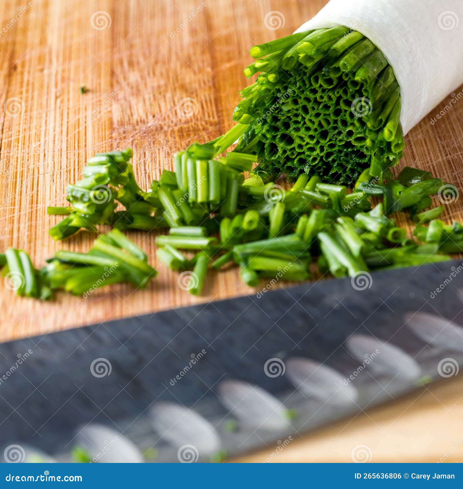 A Bundle of Chives with a Pile of Some Freshly Chopped in Front. Stock ...