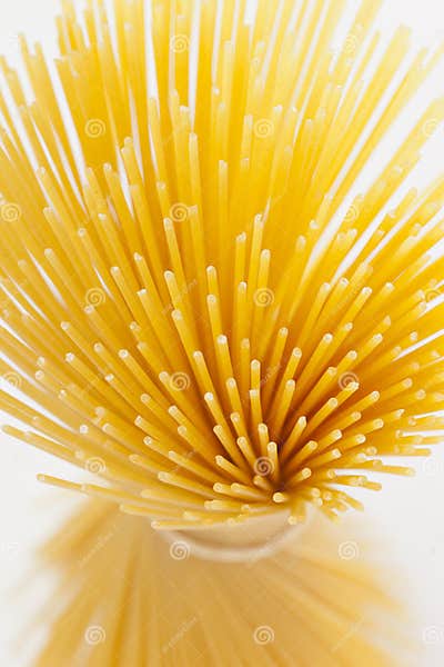 Bundle of dry spaghetti stock photo. Image of uncooked - 25162976