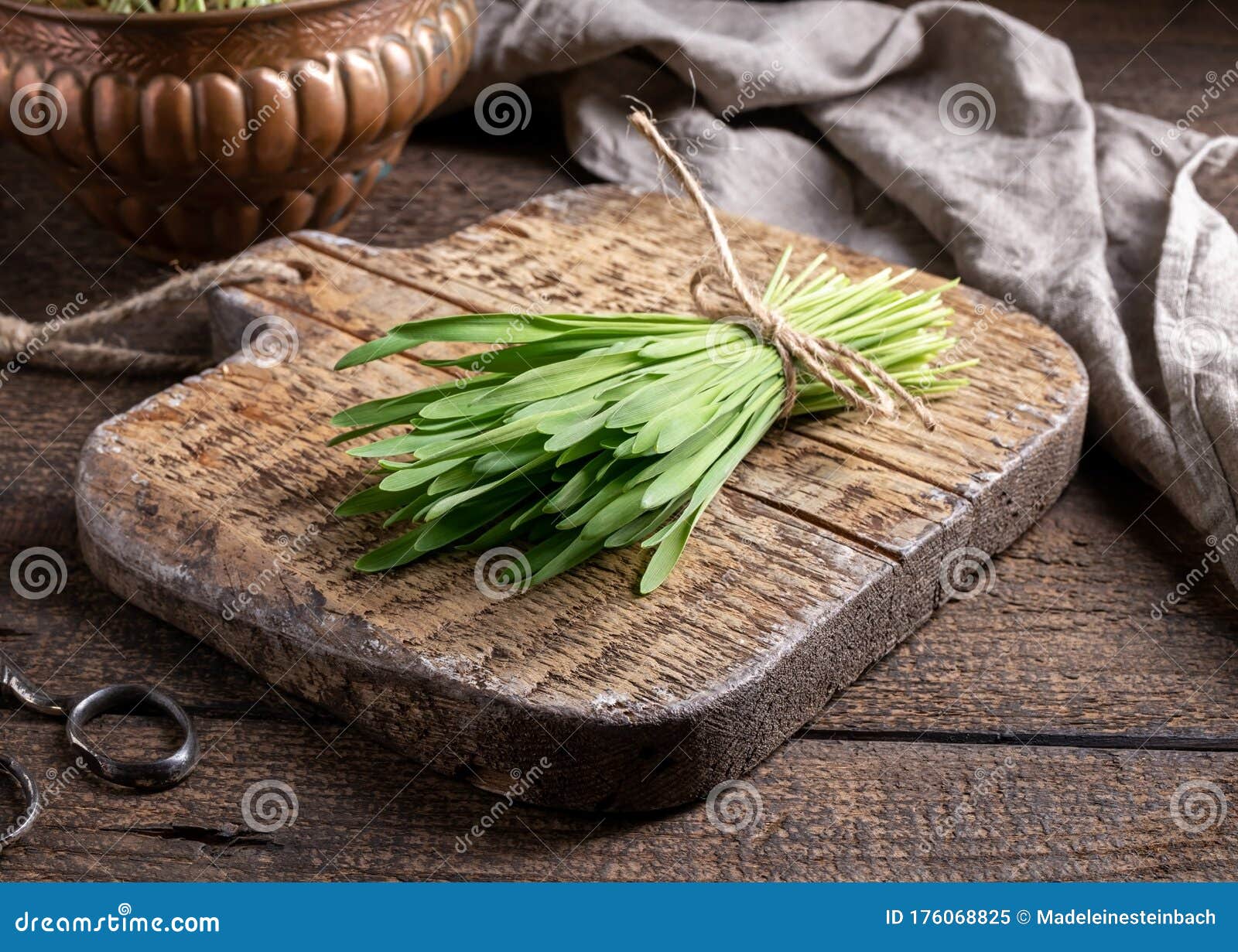 A Bundle of Fresh Barley Grass on a Wooden Table Stock Image - Image of ...