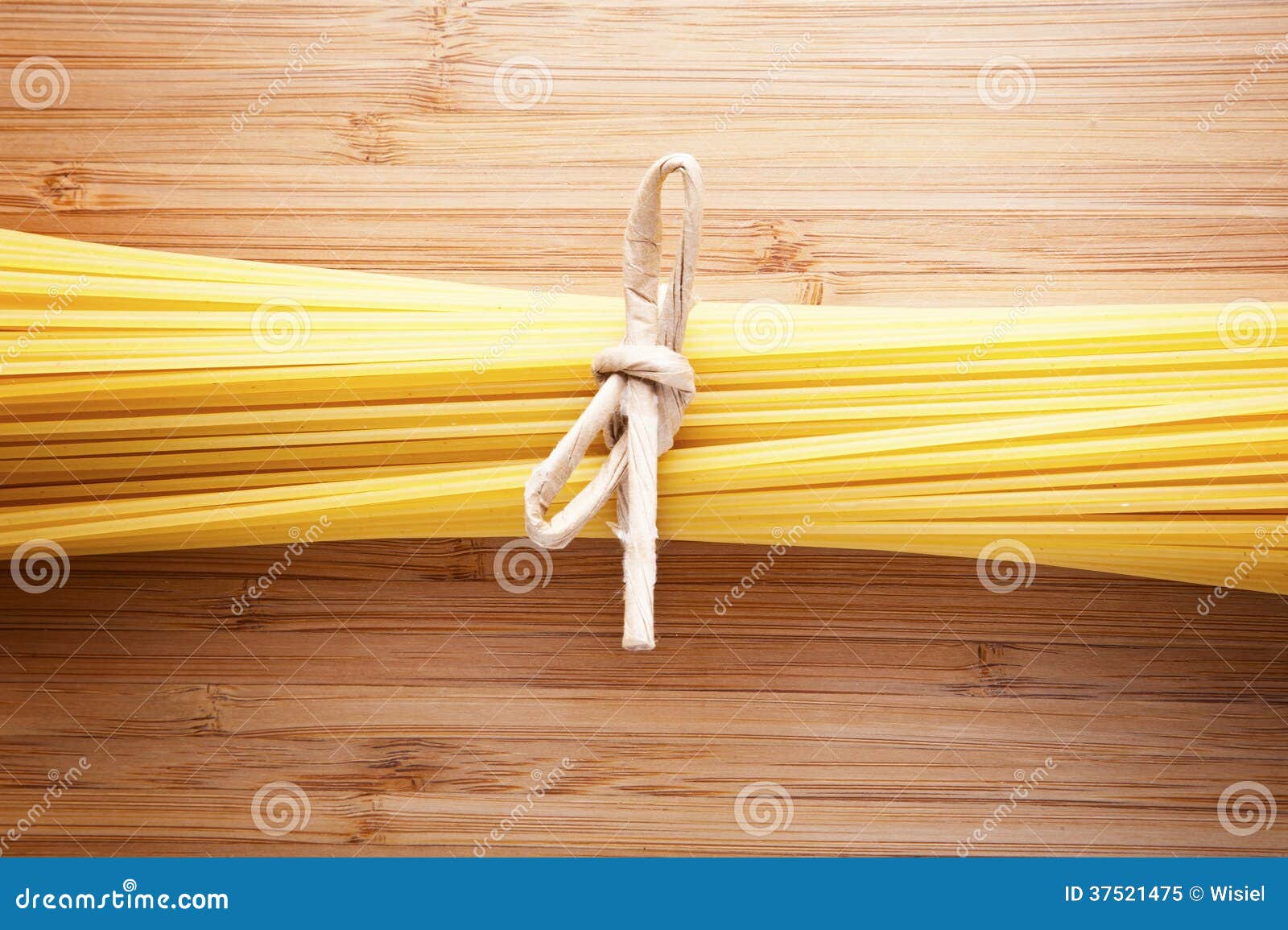 Bundle of Italian Spaghetti Pasta Tied with String Lying on Old Stock ...