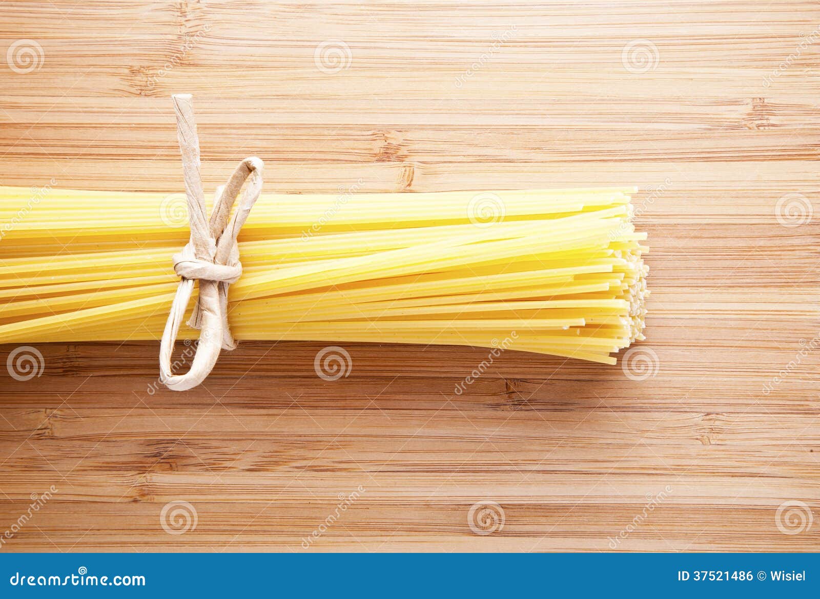 Bundle of Italian Spaghetti Pasta Tied with String Lying on Old Stock ...