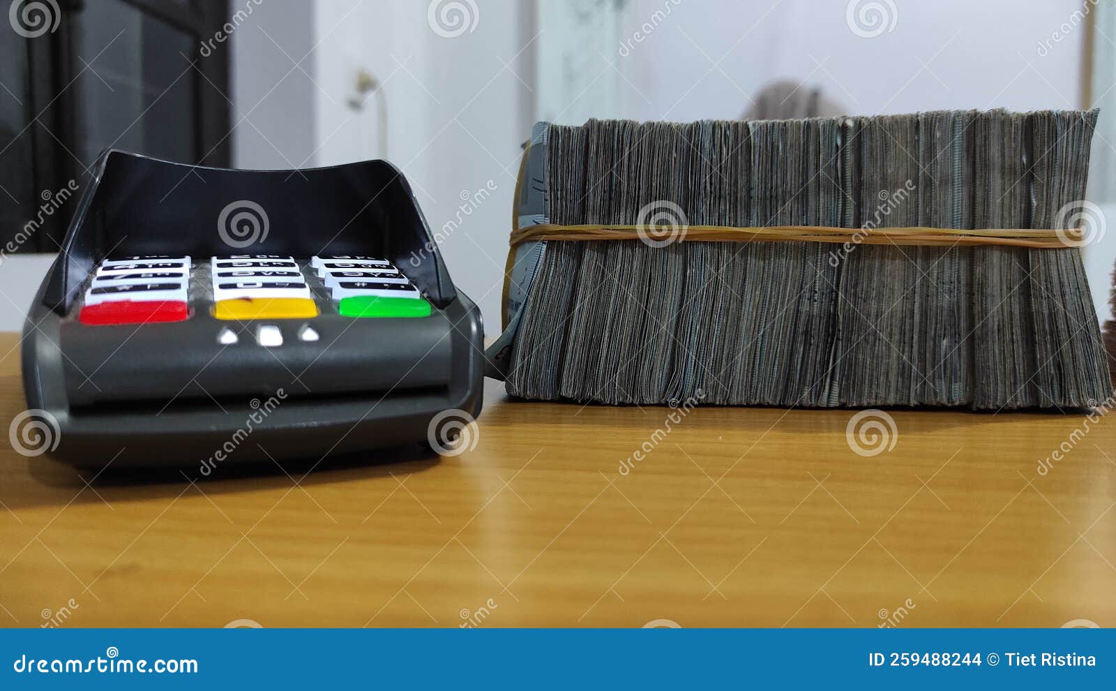 A Bundle of Money Next To Electronic Data Capture or EDC Stock Photo ...
