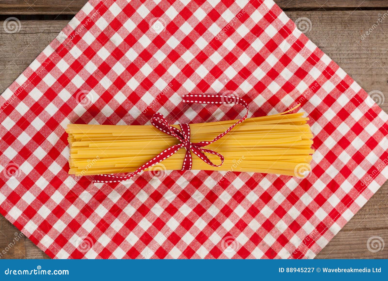 Bundle of Raw Spaghetti Tied with Red Ribbon Stock Image - Image of ...