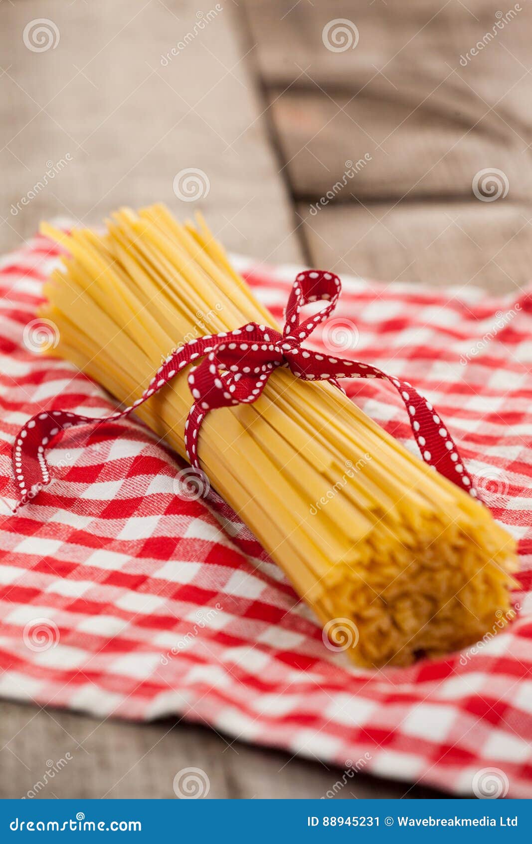 Bundle of Raw Spaghetti Tied with Red Ribbon Stock Image - Image of ...