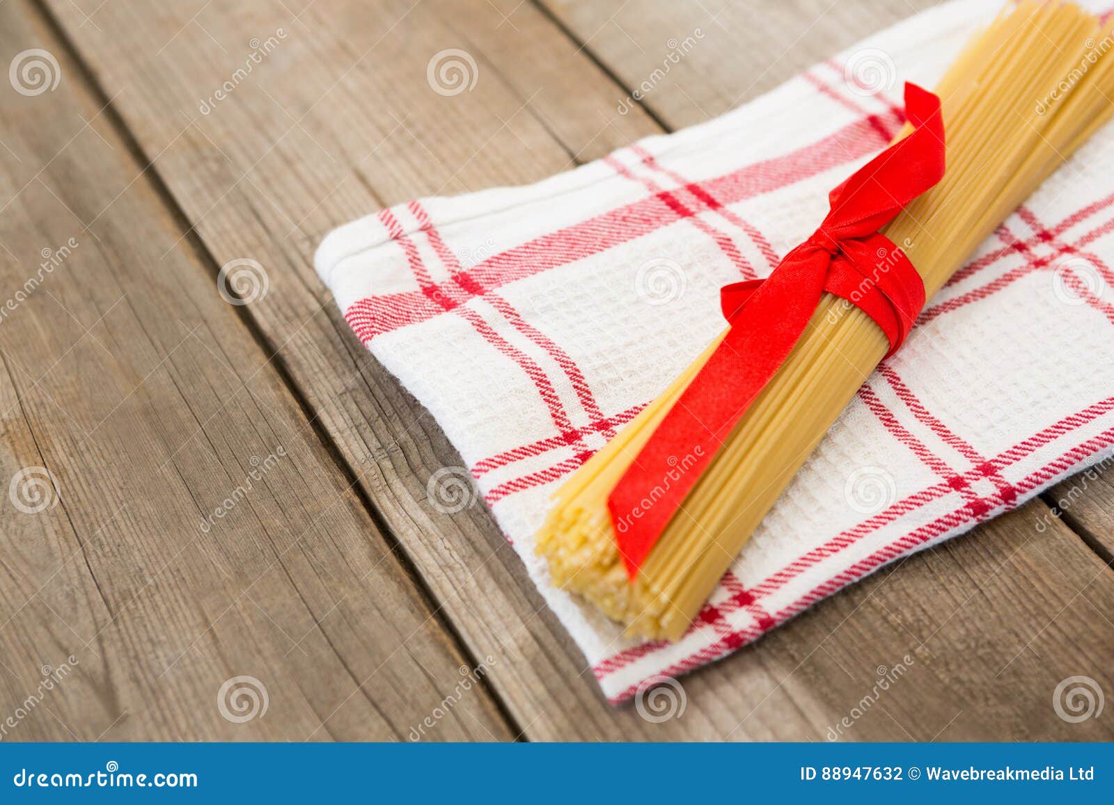 Bundle of Raw Spaghetti Tied with Red Ribbon Stock Photo - Image of ...