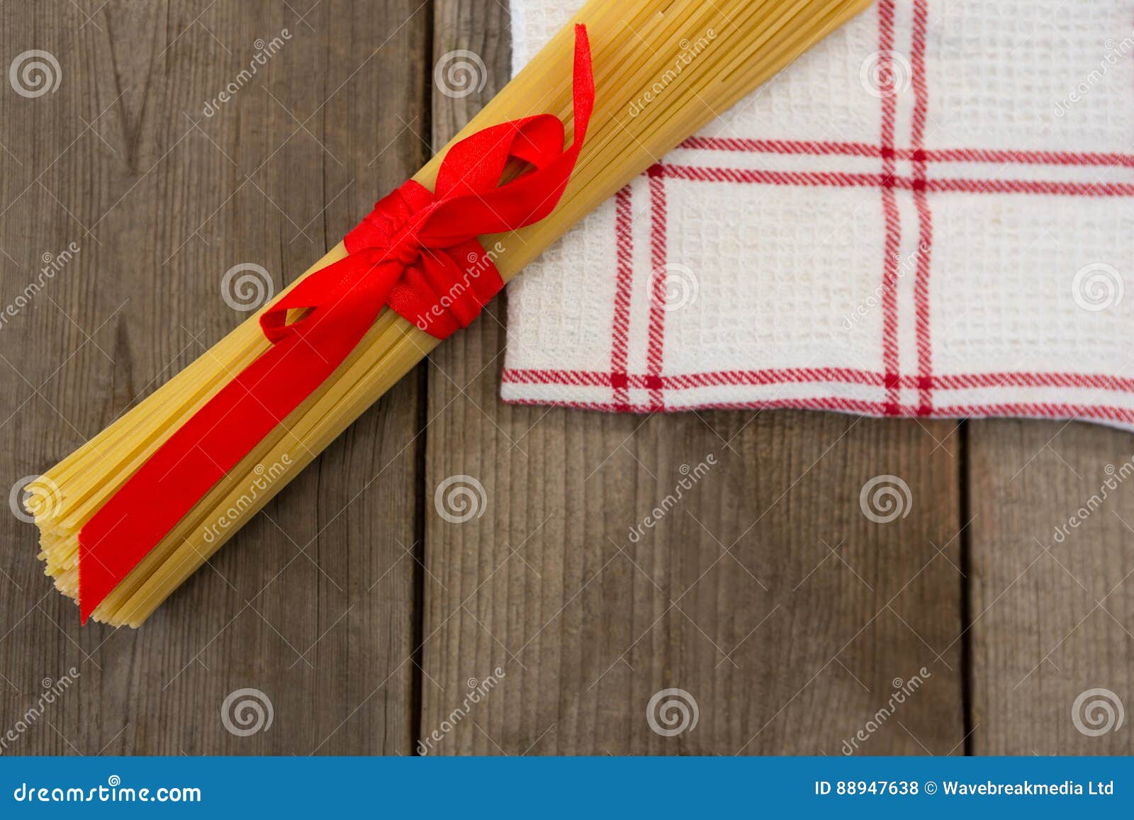 Bundle of Raw Spaghetti Tied with Red Ribbon Stock Photo - Image of ...