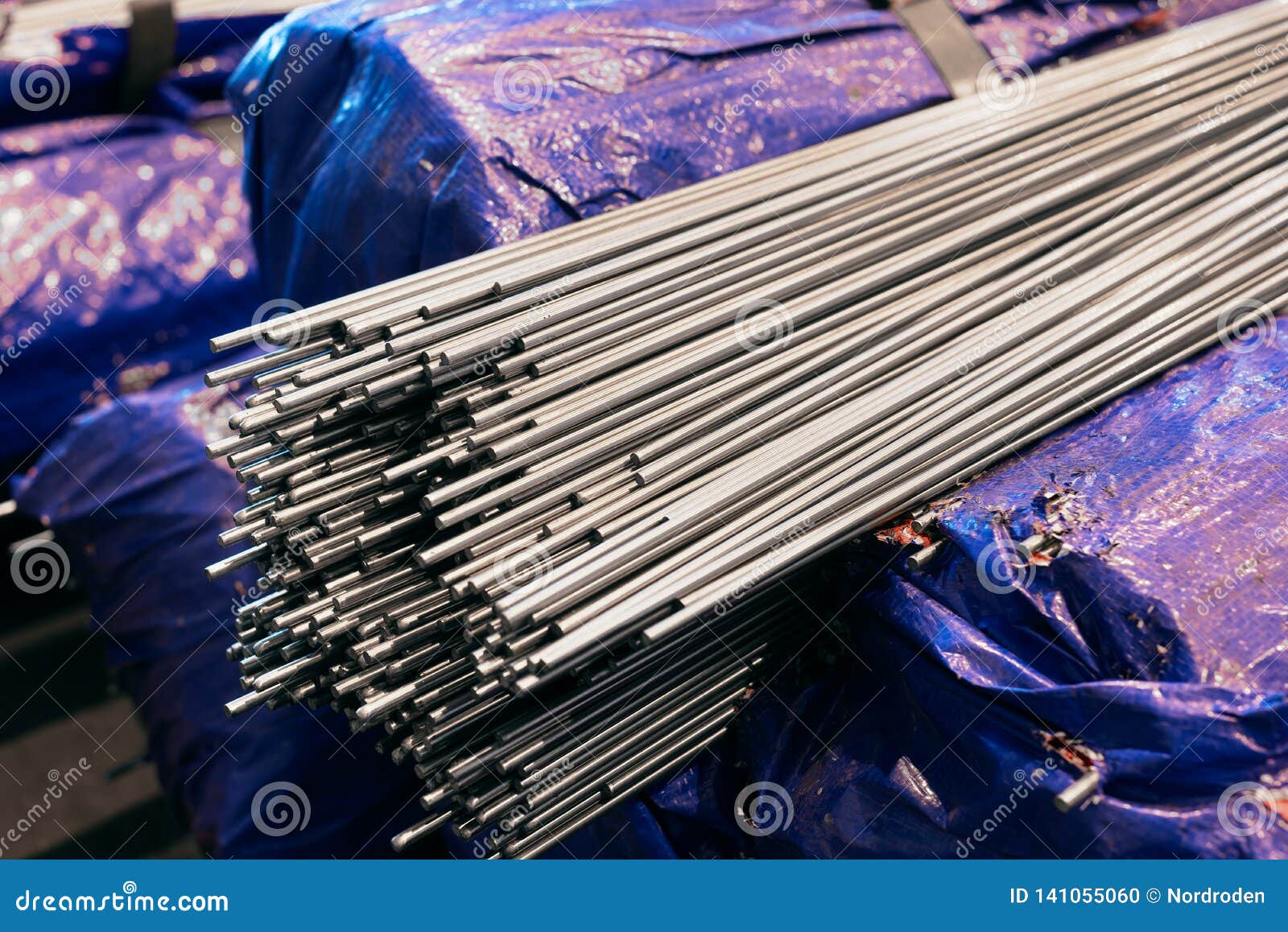 A Bundle of Stainless Steel Bars. Large Industrial Warehouse Metal ...