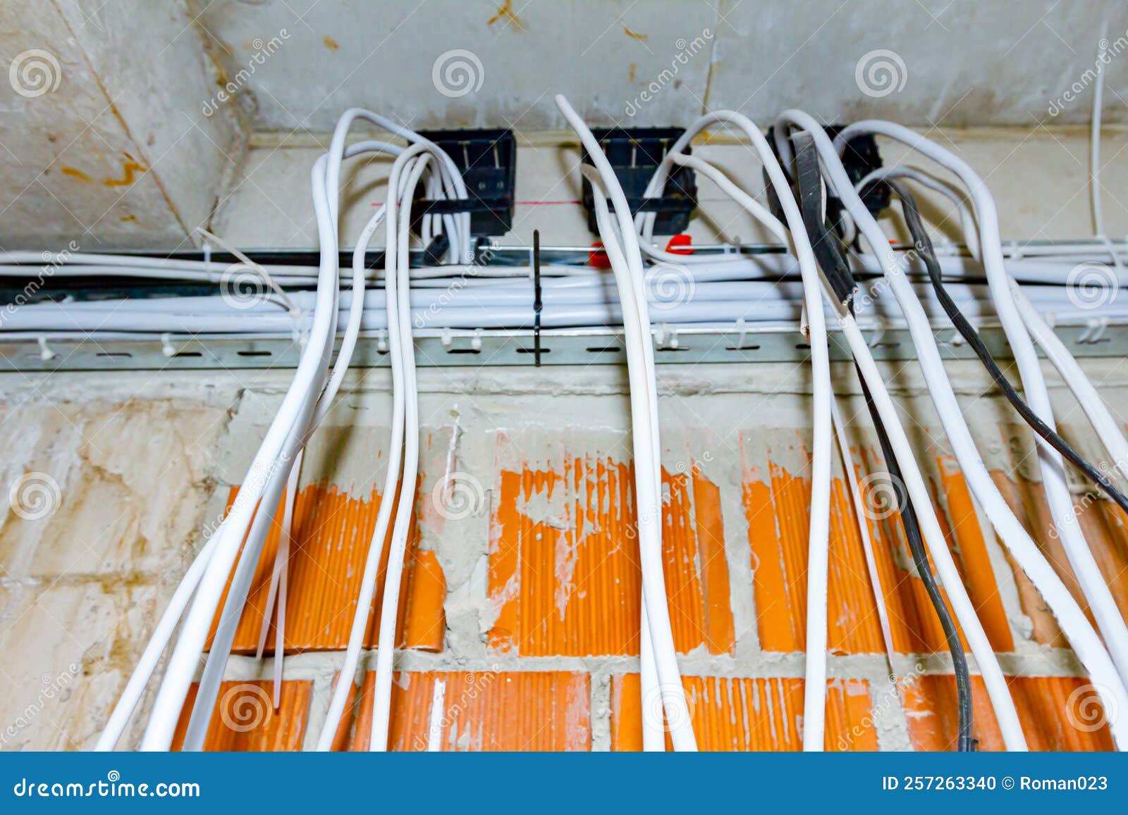 Bundle of Various Cables are Hanging from Above in Indoor of Building ...