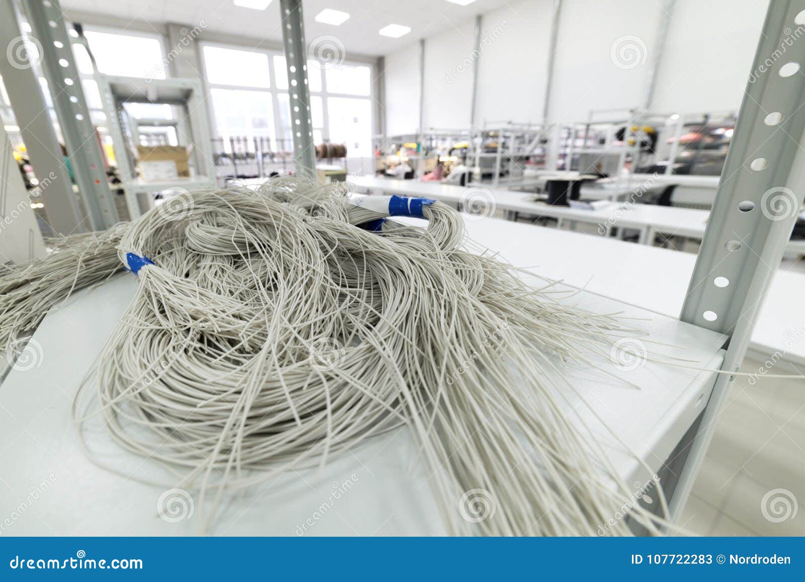 A Bundle of White Insulated Wire on the Rack. Stock Image - Image of ...