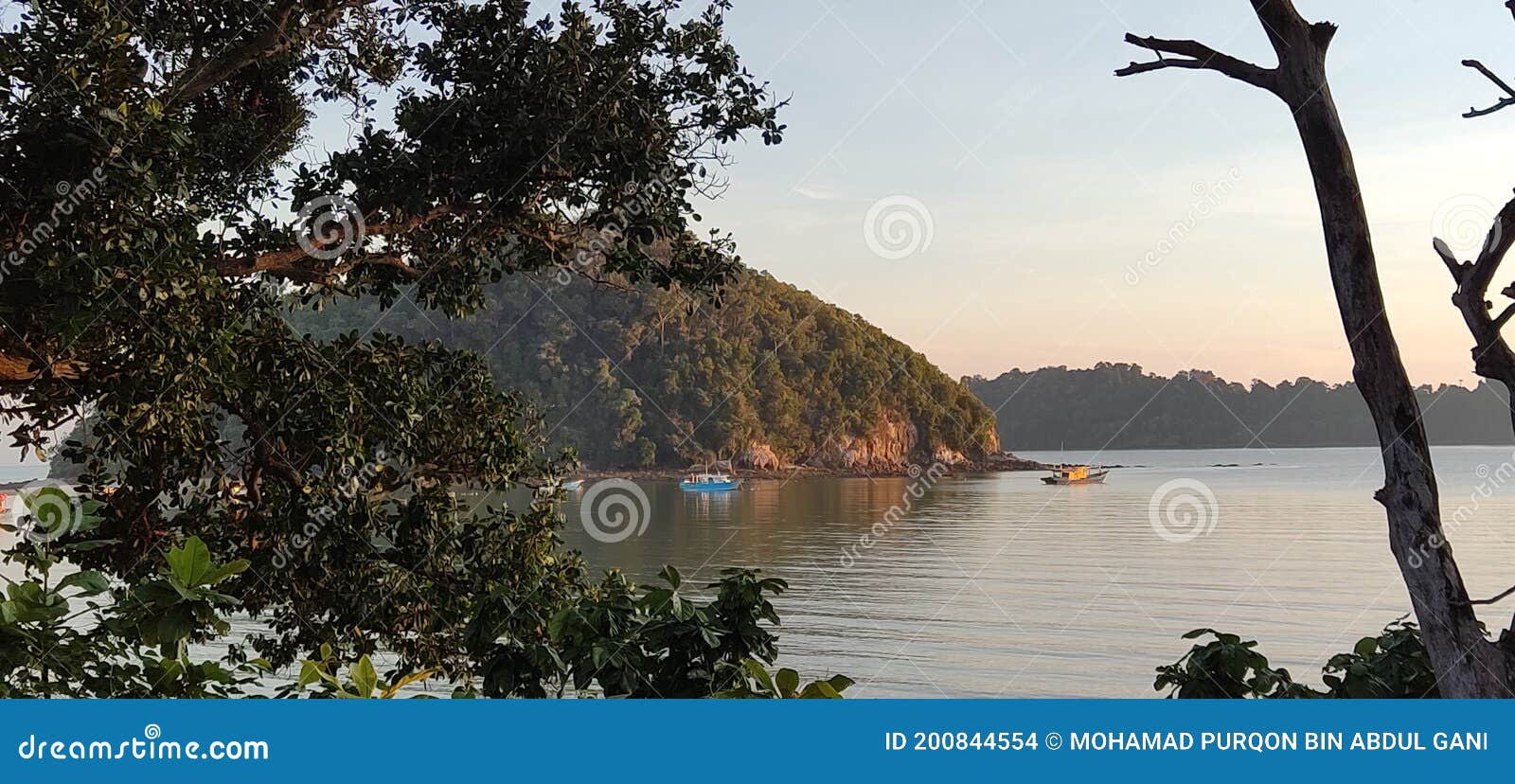 Sunset at lanun island stock photo. Image of line, sunlight - 200844554