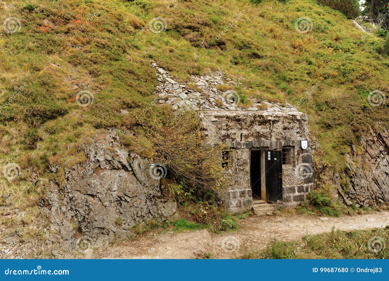Bunker built in the rock stock photo. Image of bunker - 99687680