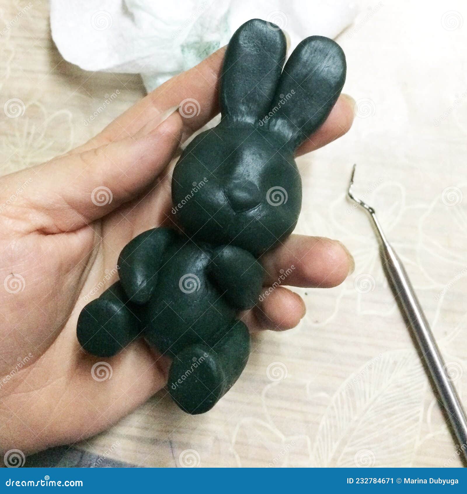 Model Bunny of Plasticine To Create a Pattern. the Birth of a New Toy ...