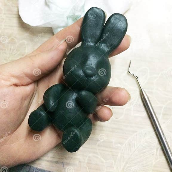 Model Bunny of Plasticine To Create a Pattern. the Birth of a New Toy ...