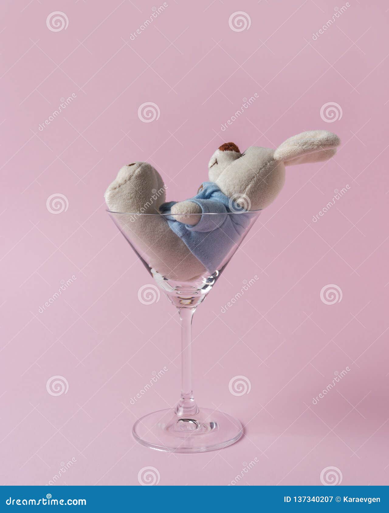 Bunny Toy in Martini Glass on Pink Background. Creative Minimal Concept ...