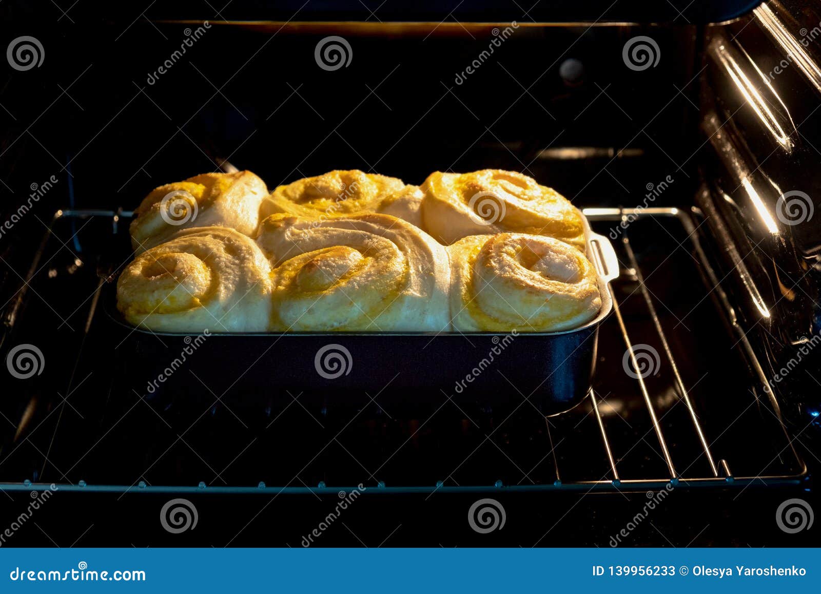 Buns are baked in the oven stock image. Image of homemade - 139956233