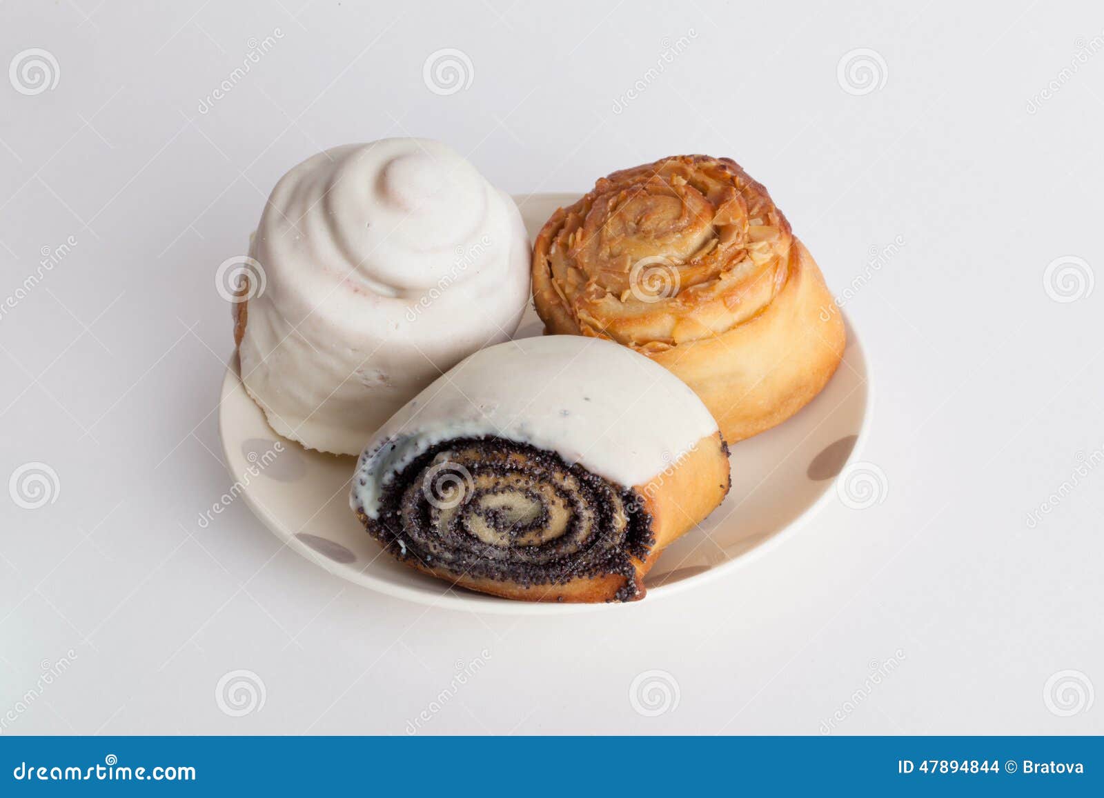 Buns with Poppy Seeds, White Icing and Jam on a Stock Photo - Image of ...