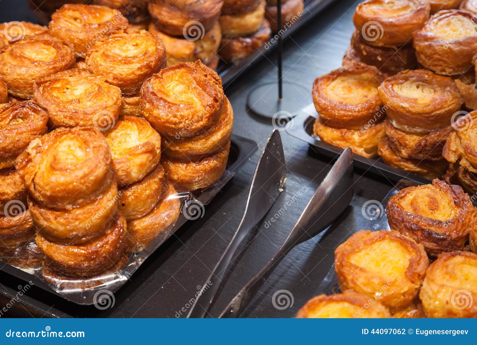 Buns of Puff Pastry on the Shelves of Bakery Stock Photo - Image of ...