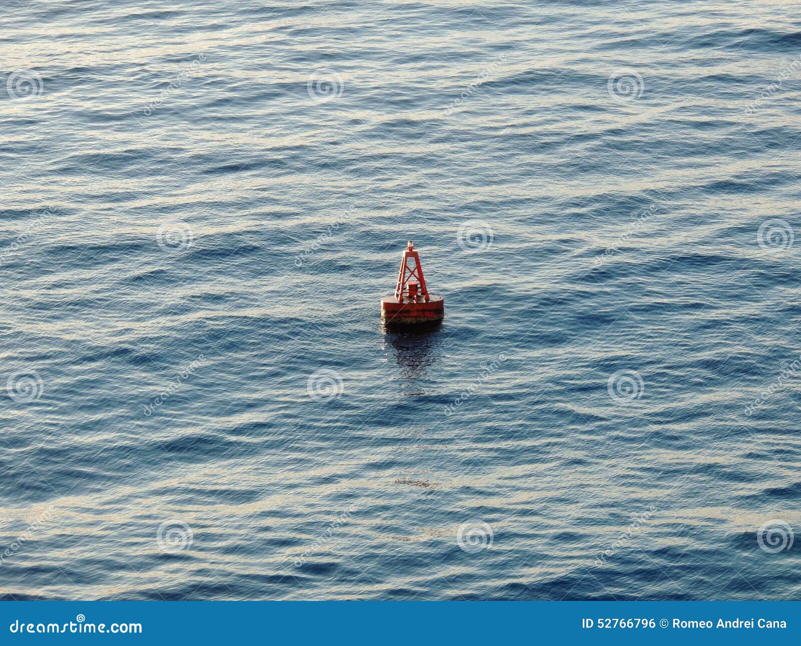 Buoy Floating in the Ocean stock photo. Image of lost - 52766796