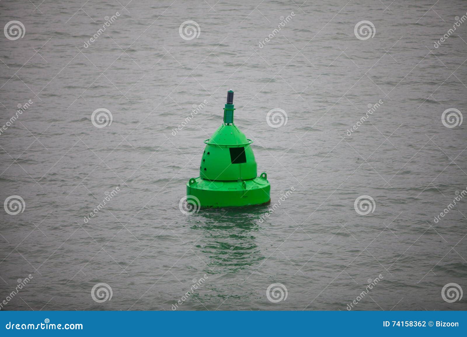 Buoy floating in water stock photo. Image of navigation - 74158362