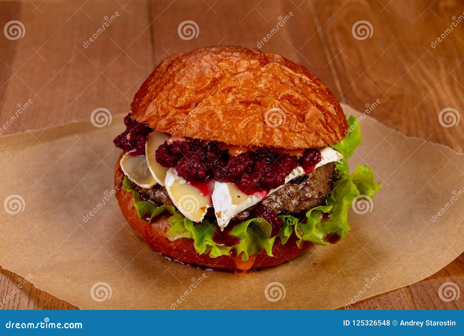 Burger with beef and brie stock photo. Image of brie - 125326548