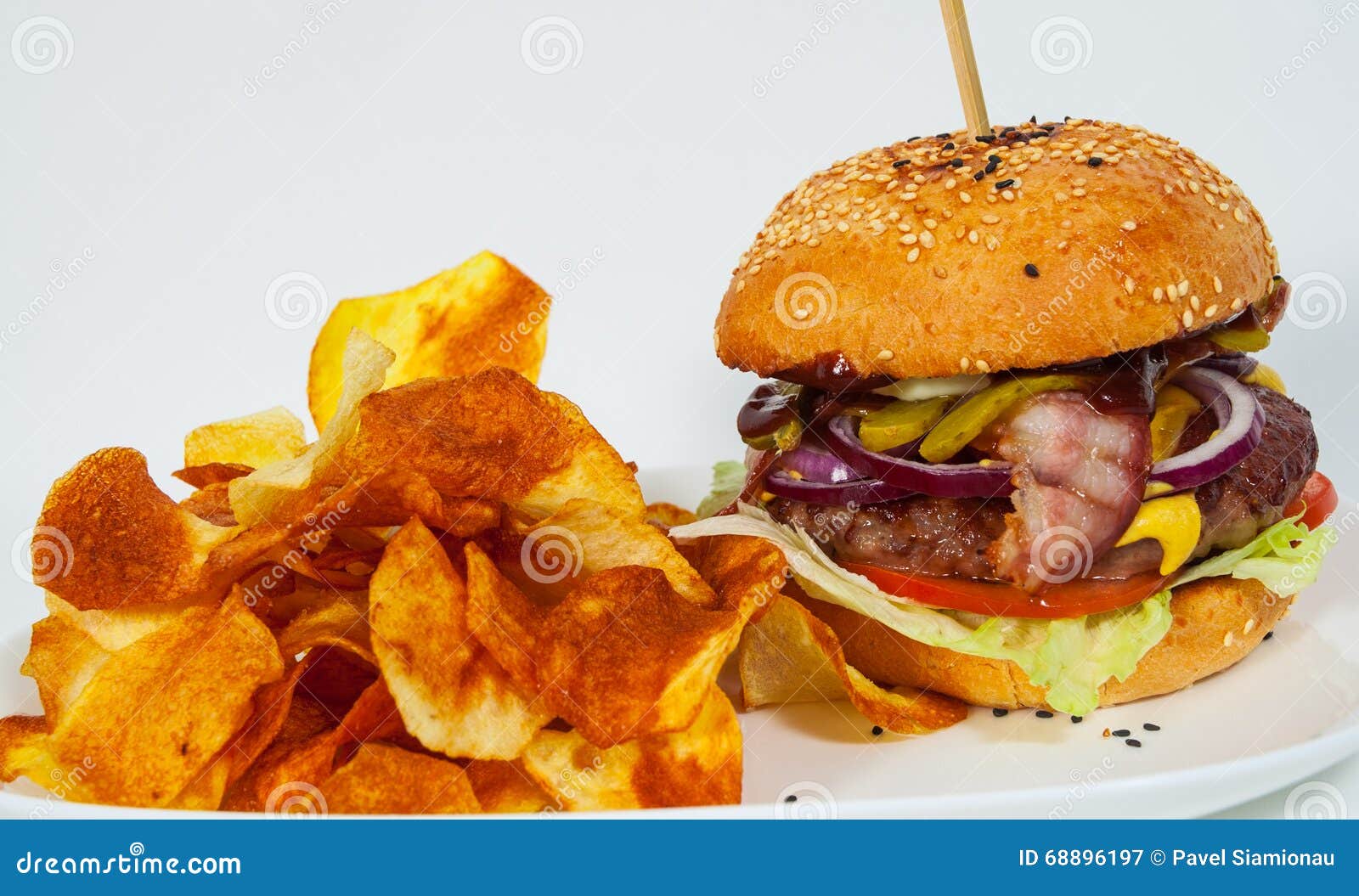 Burger with Beef Patty Tomato Onion and Potato Chips Stock Image ...